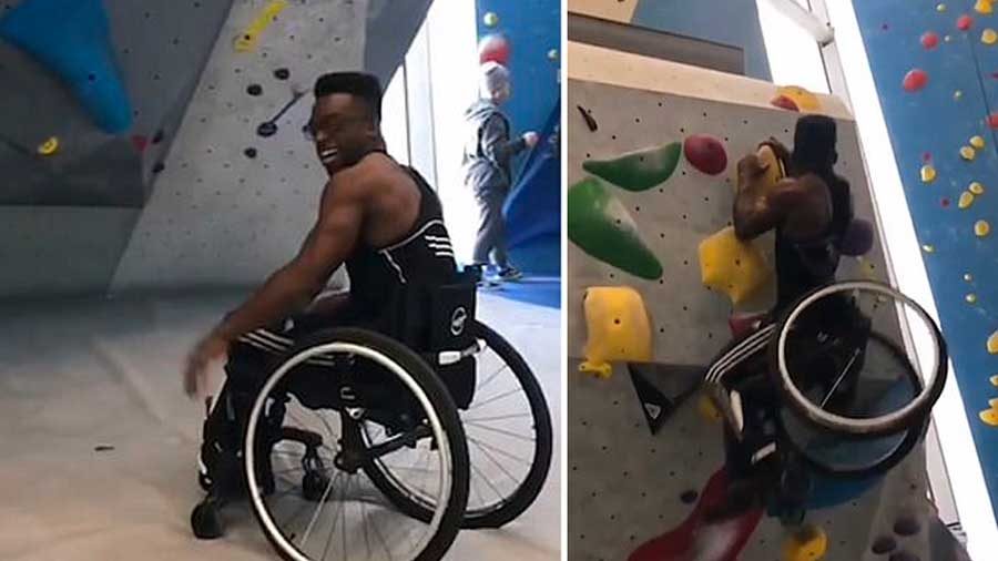 Un athlète handicapé grimpe un mur d’escalade avec son fauteuil roulant